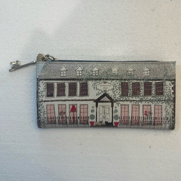 Disney | Bags | Disney Epcot House Disaster Designs Zip Wallet English ...